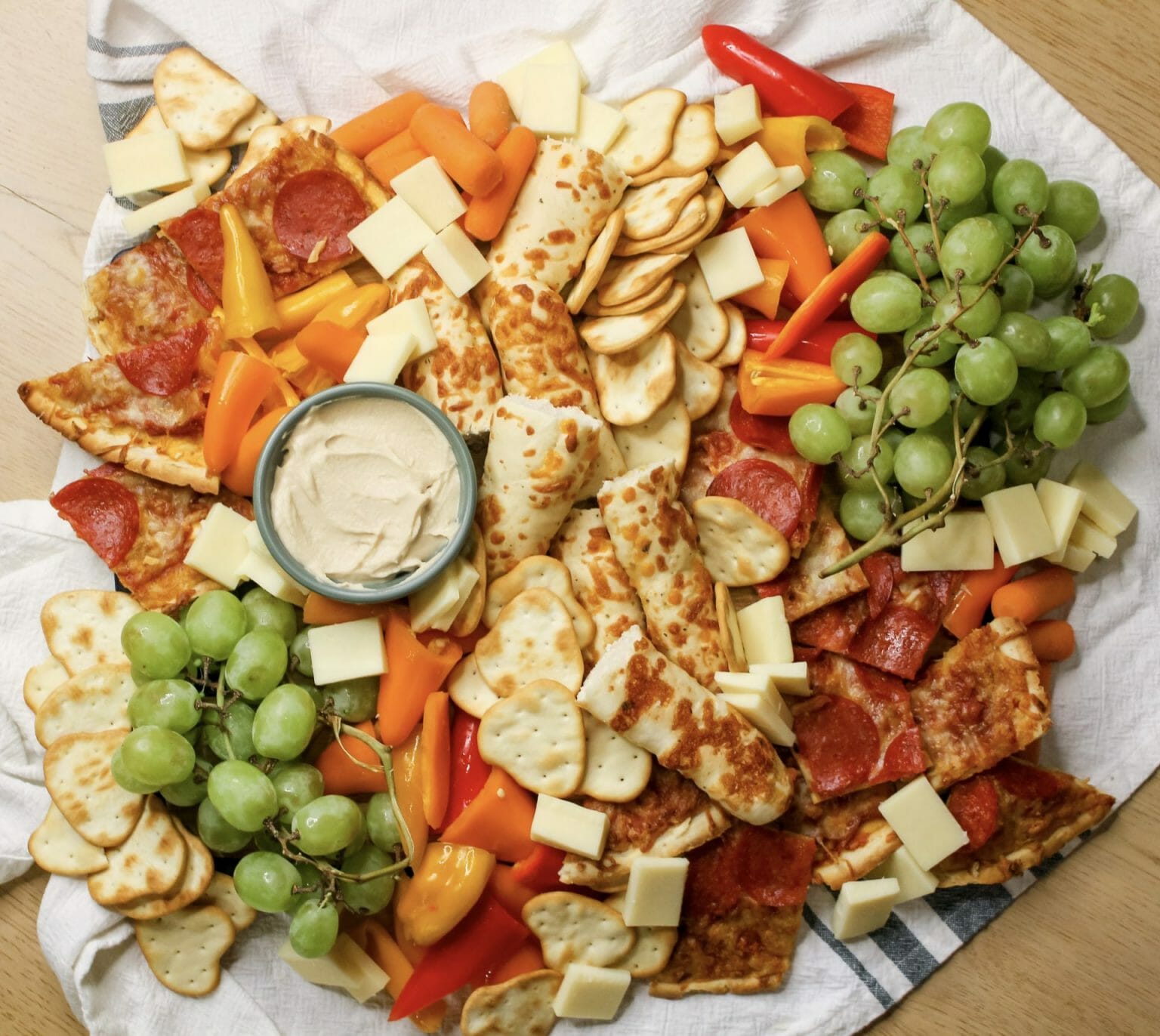 Slice, Snack, Savor: How To Create A Pizza Charcuterie Board