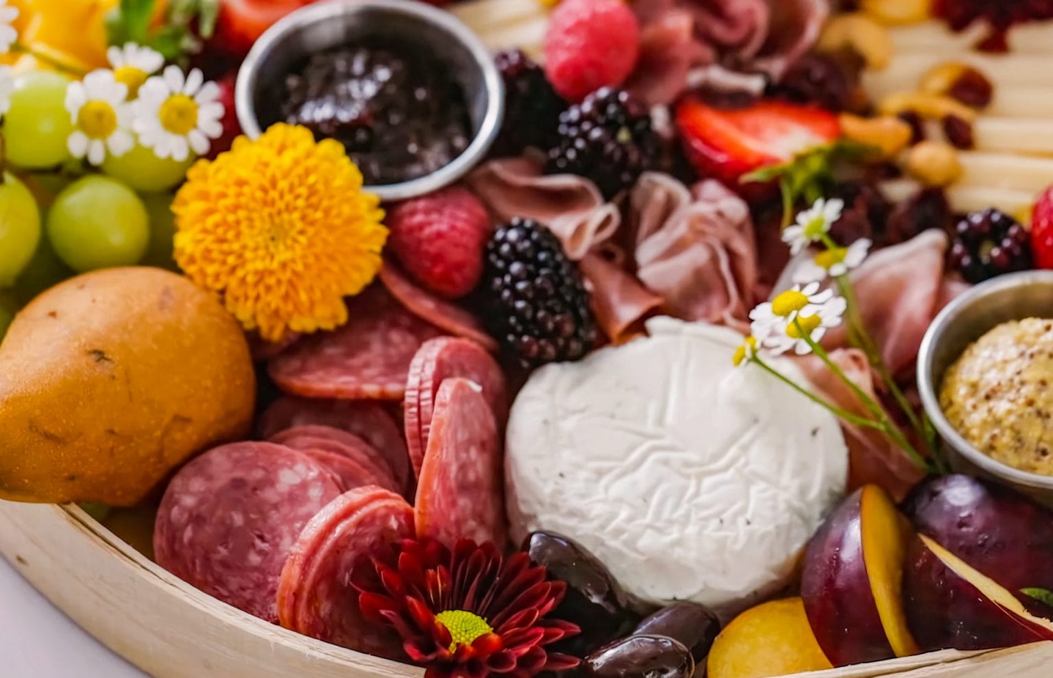 Petals And Platters: How To Incorporate Charcuterie Board Flowers